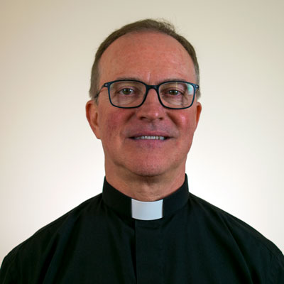 Very Rev James T Volkert